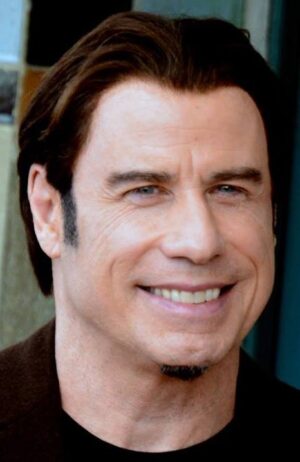 De haartransformaties van John Travolta door de jaren heen ...